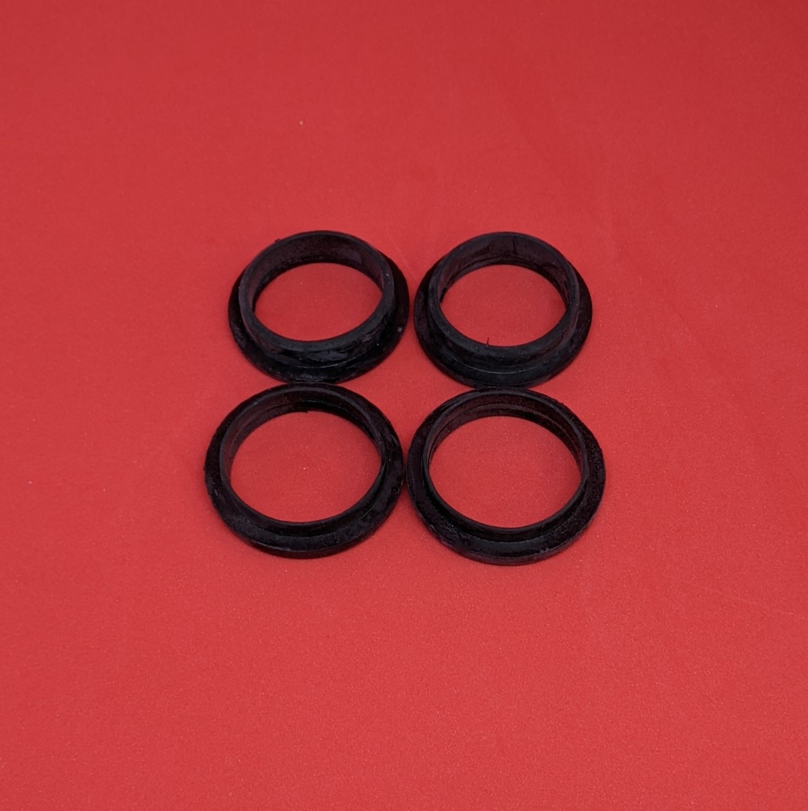Headlight holder locating rubber set